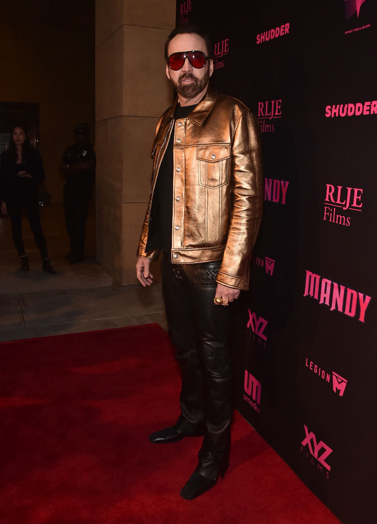 Nicolas Cage hits 'Mandy' red carpet in stylish gold jacket along with ...